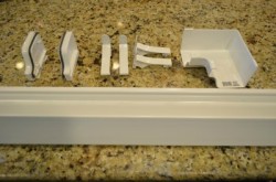 How to build a book shelf out of a vinyl rain gutter – DIY – A Thrifty Mom