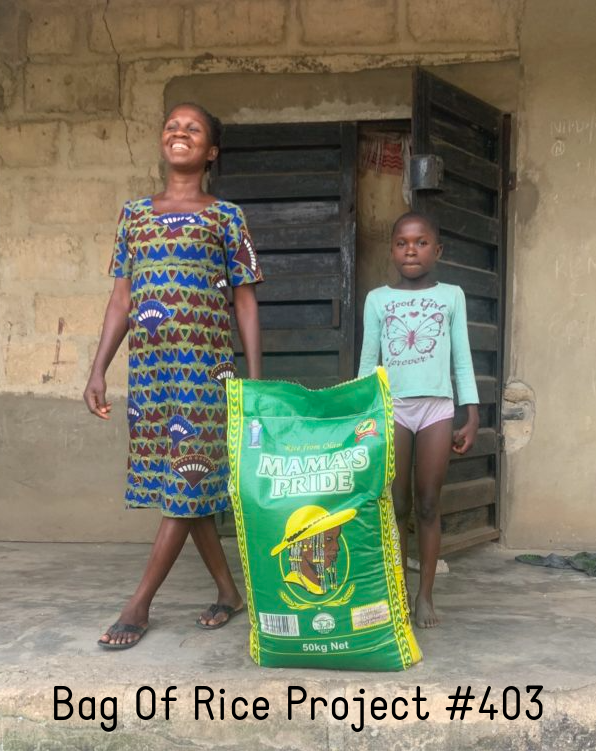 Bag of Rice Project #403 -A visit to the John family - A Thrifty Mom