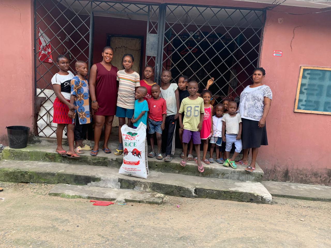 Bag of Rice Project #465 -A visit to the Usen family – A Thrifty Mom